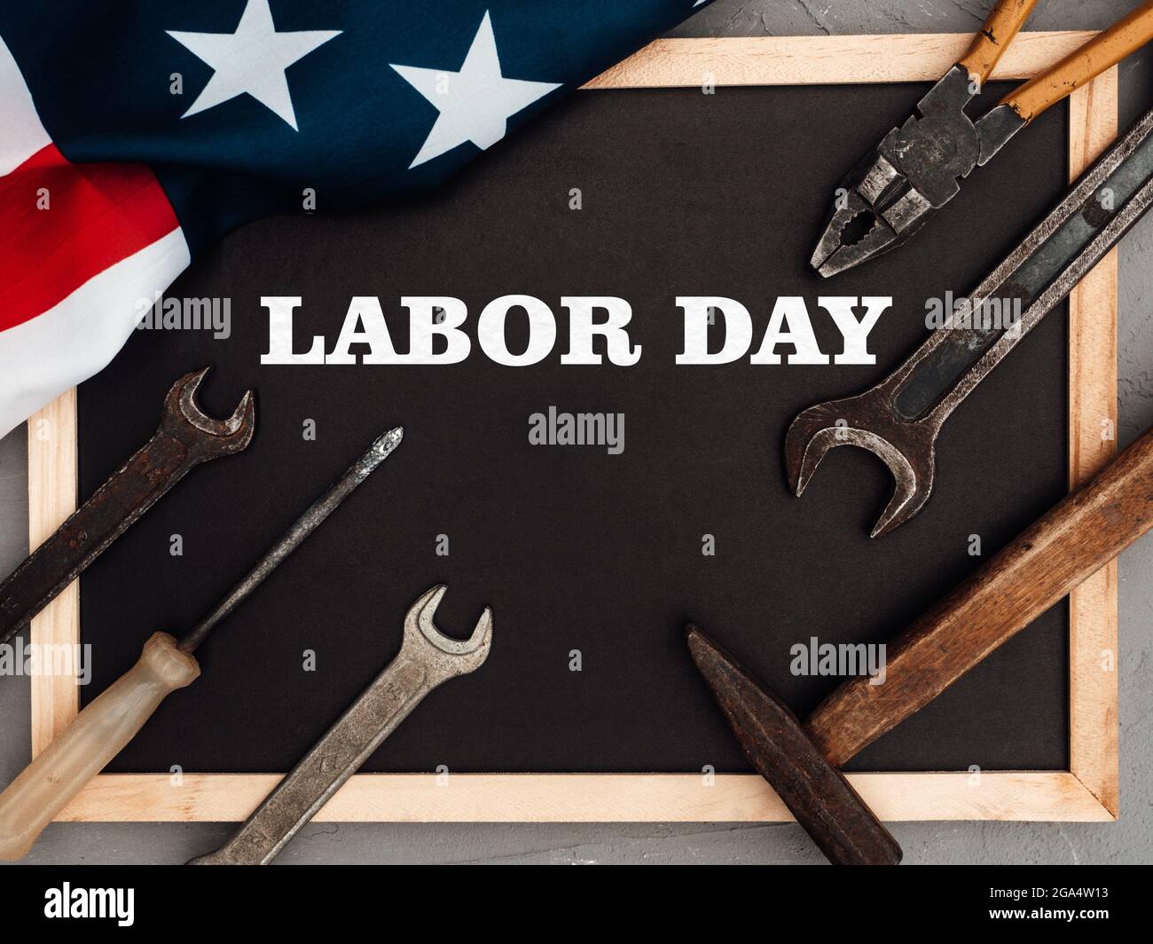 LABOR DAY. Hand tools and the Flag of the United States of America ...