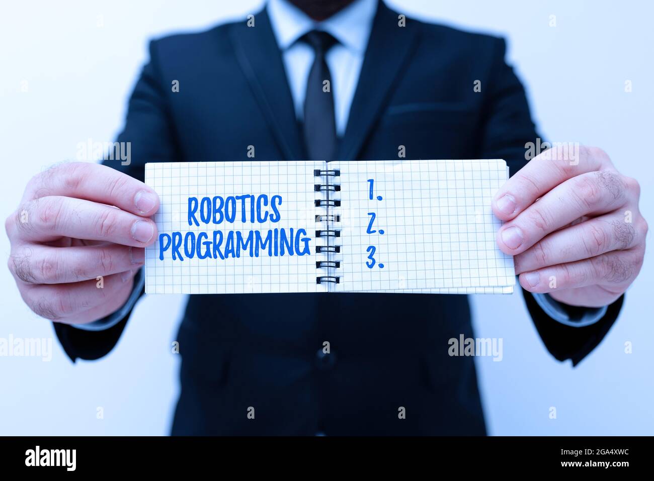 Hand writing sign Robotics Programming. Business showcase software that used to perform ...