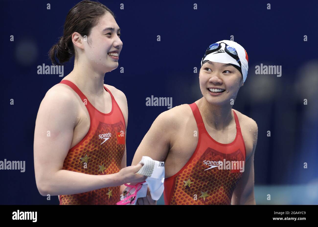 Tokyo, Japan. 29th July, 2021. Zhang Yufei (L) of China talks with ...