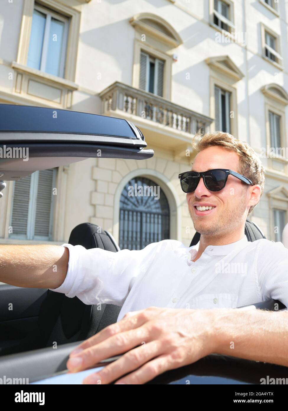 Driver - man driving car Stock Photo - Alamy