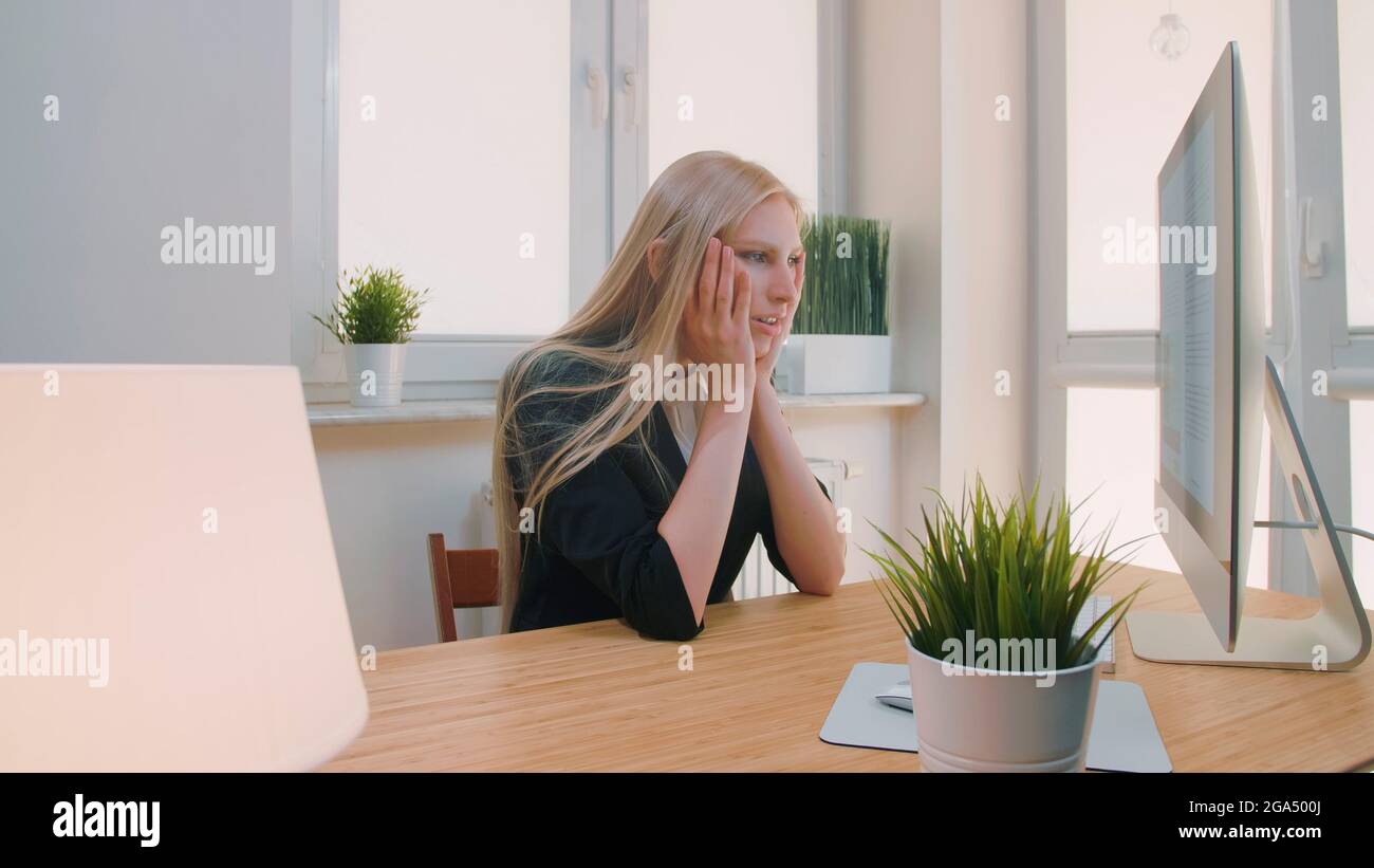Sad entrepreneur sitting office desk hi-res stock photography and ...