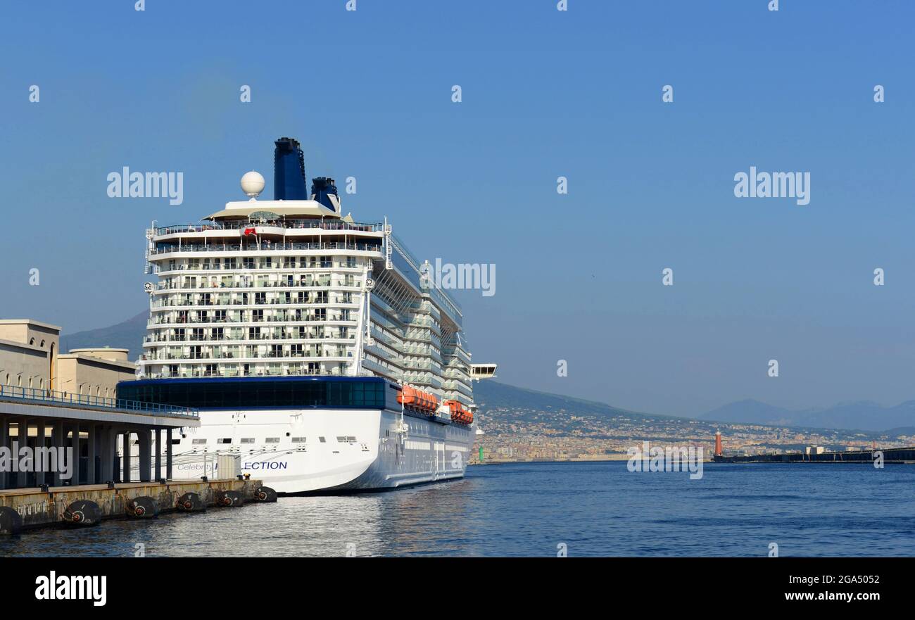 A large cruise ship docking at the harbor in Naples, Italy Stock Photo ...
