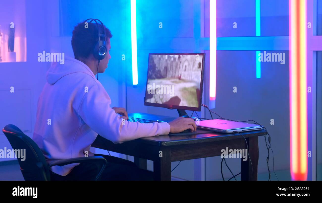 African gamer playing space shooter hi-res stock photography and images ...