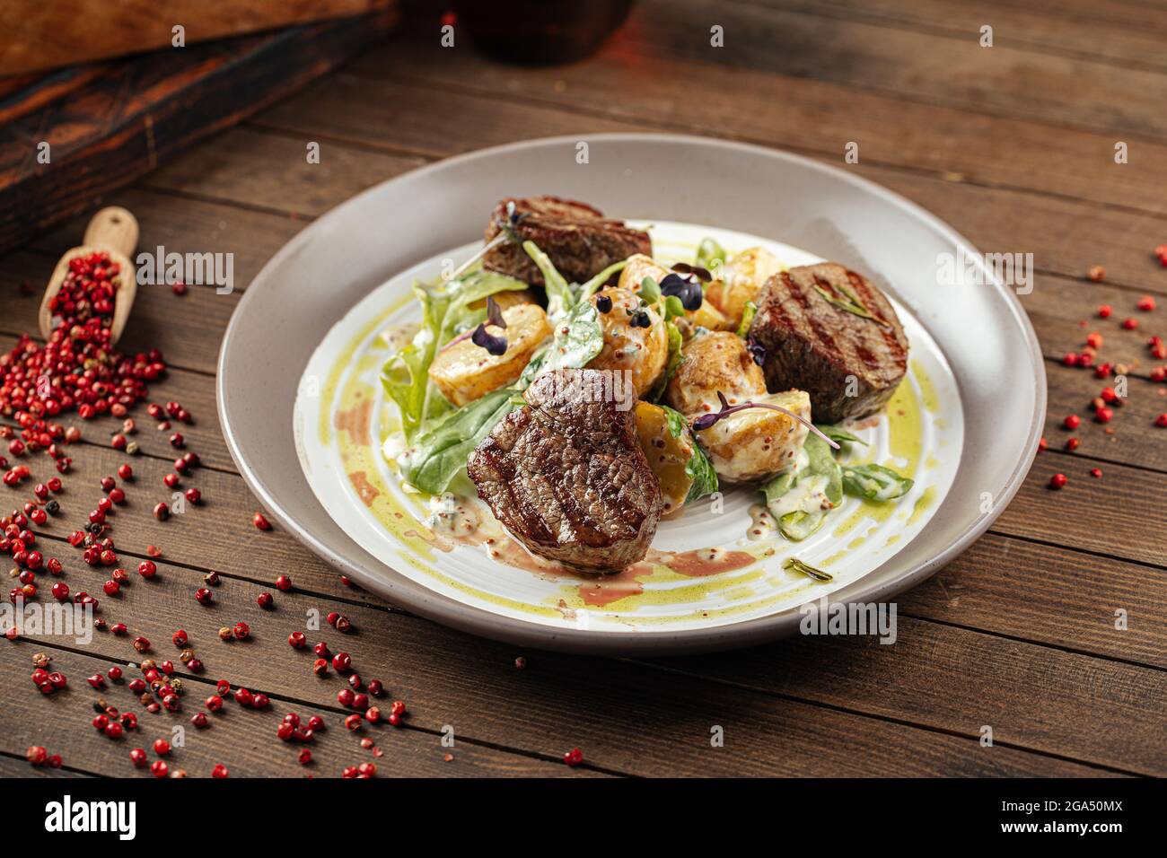 Plate of fillet mignon steak with potato Stock Photo - Alamy