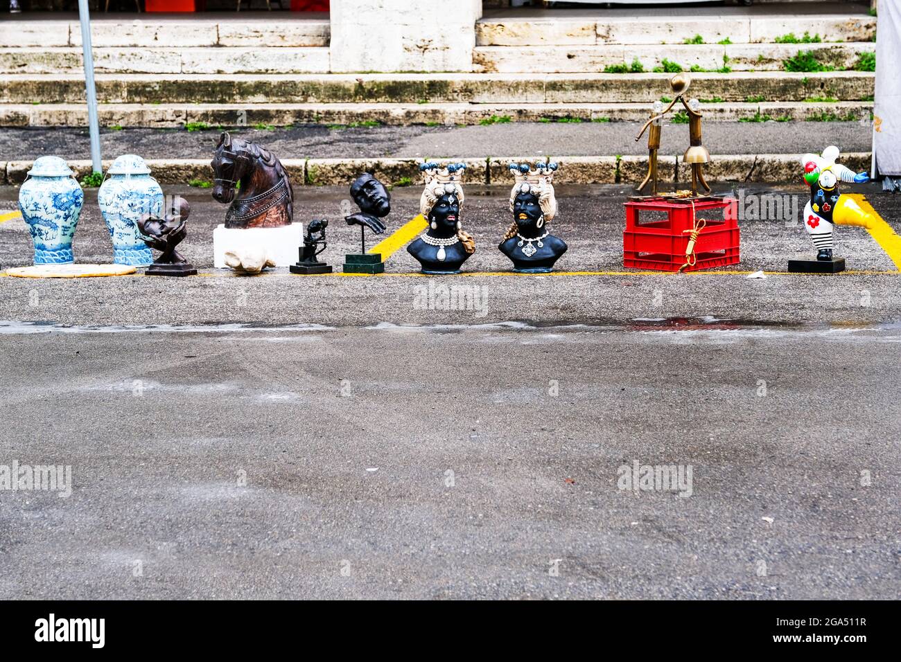 Various objects displayed for sale at a market in Perugia Italy Stock ...