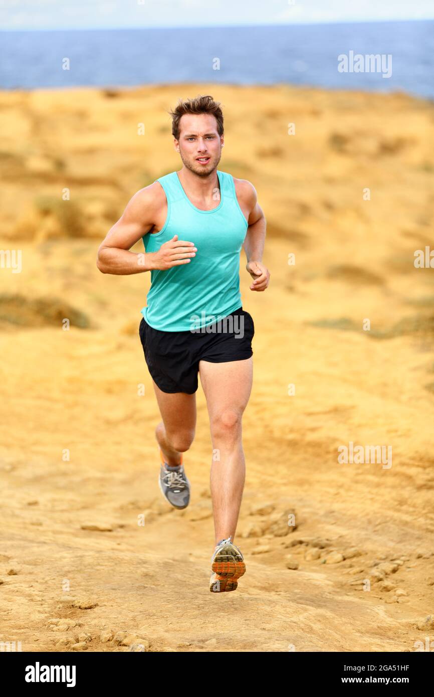 Running athlete man Stock Photo - Alamy