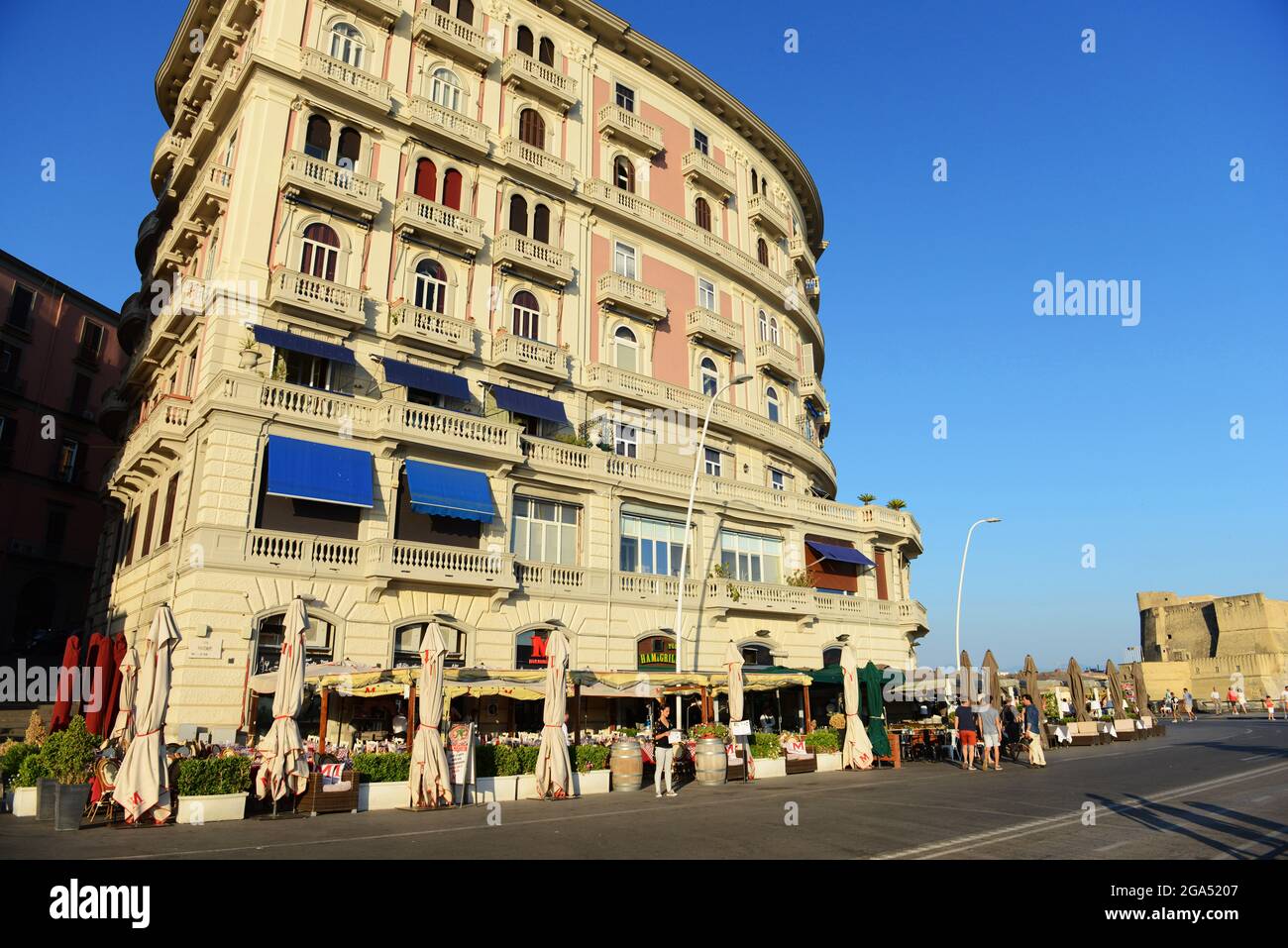 Restaurants bars and cafes under the beautiful buildings along via ...