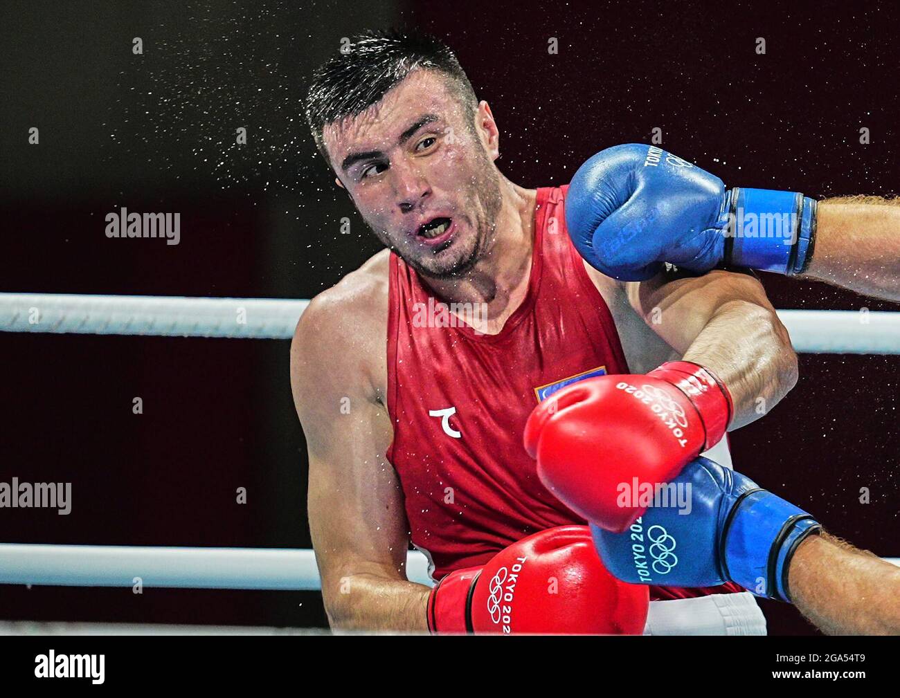 July 29, 2021: Bakhodir Jalolov from Uzbekistan and Mahammad Abdullayev ...