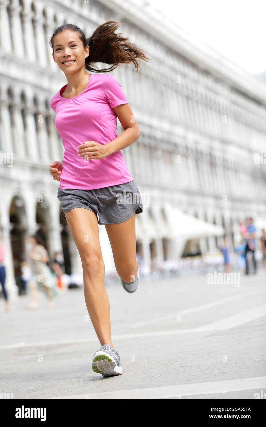 Running runner woman jogging in Venice Stock Photo - Alamy
