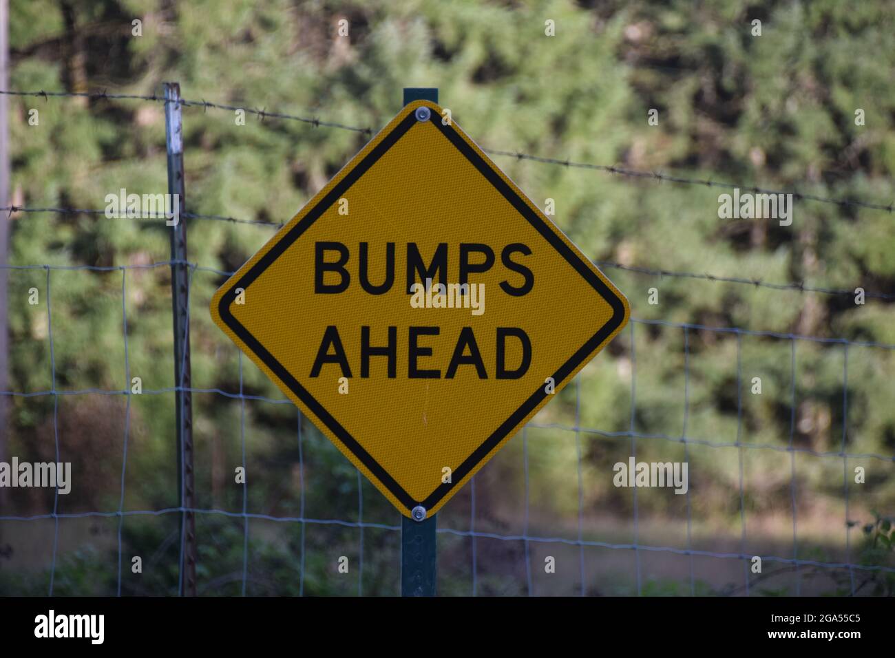 A 'bumps ahead' sign in the countryside Stock Photo - Alamy