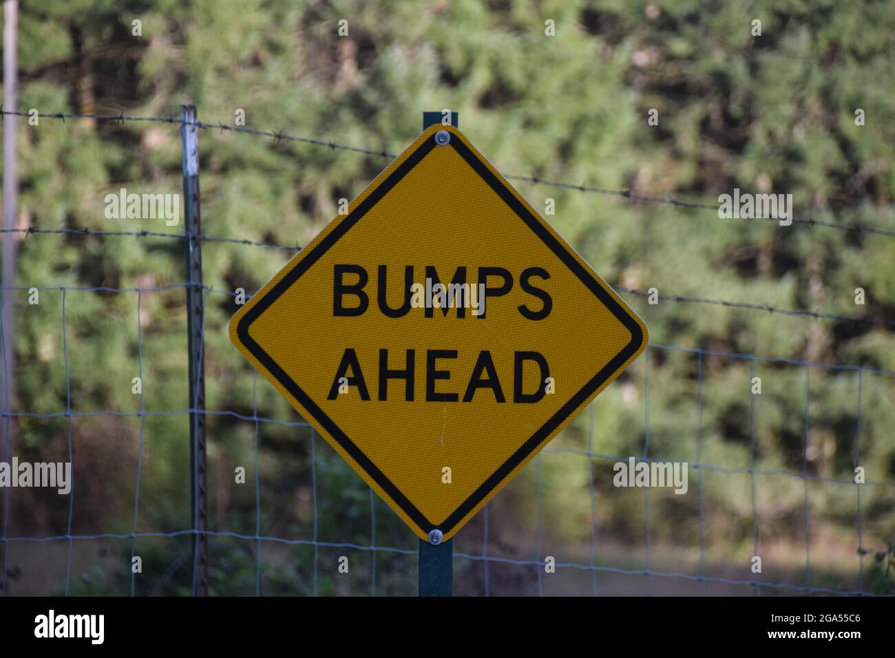 A 'bumps ahead' sign in the countryside Stock Photo - Alamy