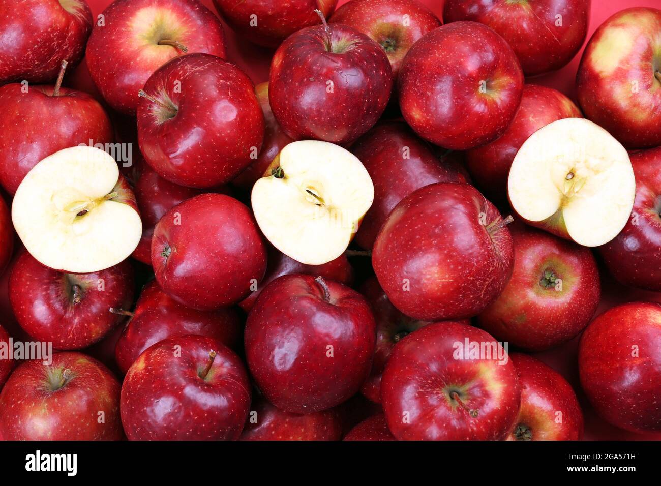 Red apples background Stock Photo - Alamy