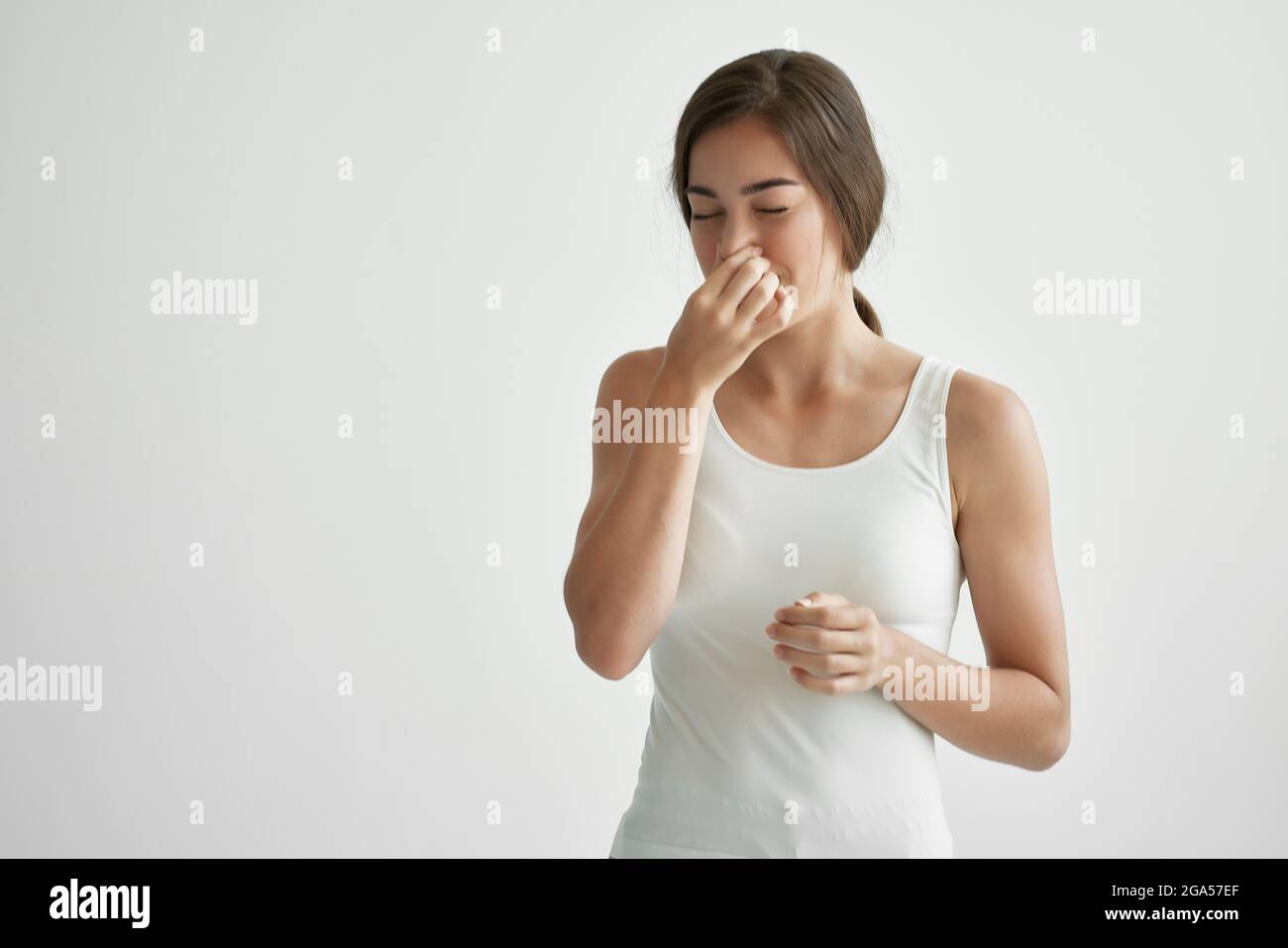 woman in white t-shirt handkerchief allergy cold runny nose Stock Photo ...