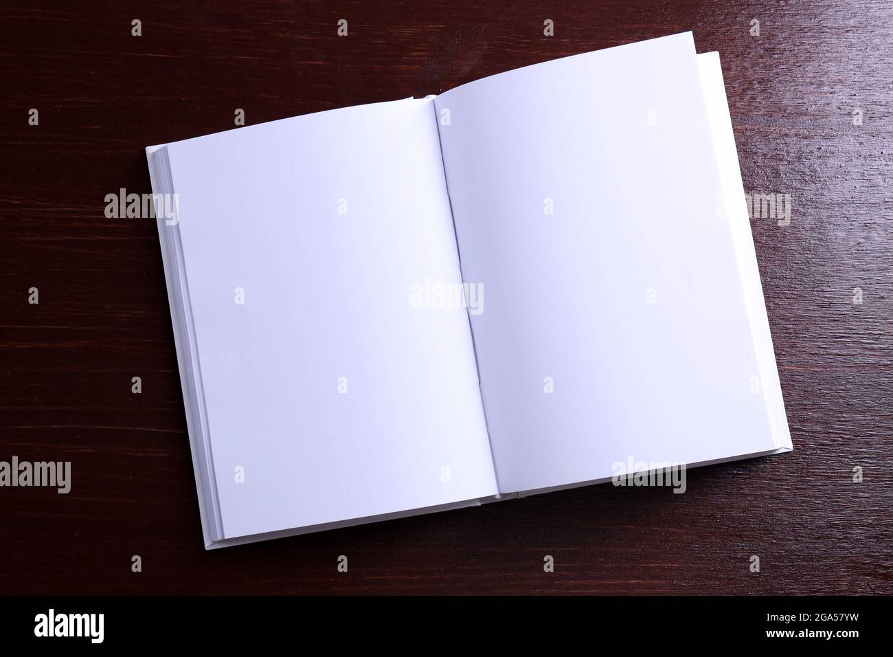 Blank open book on wooden background Stock Photo - Alamy