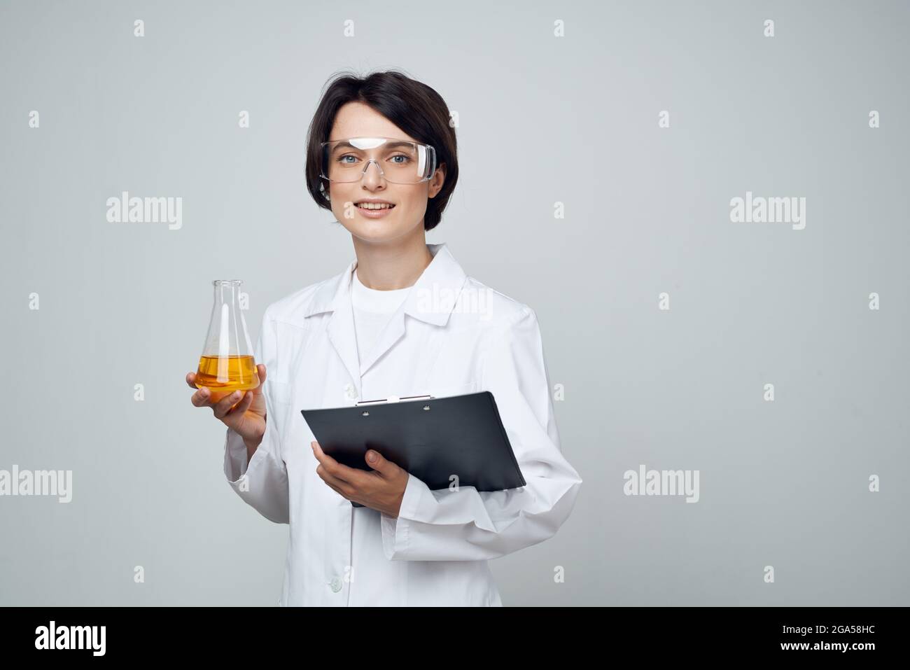female doctor tests as part of chemistry research Stock Photo - Alamy
