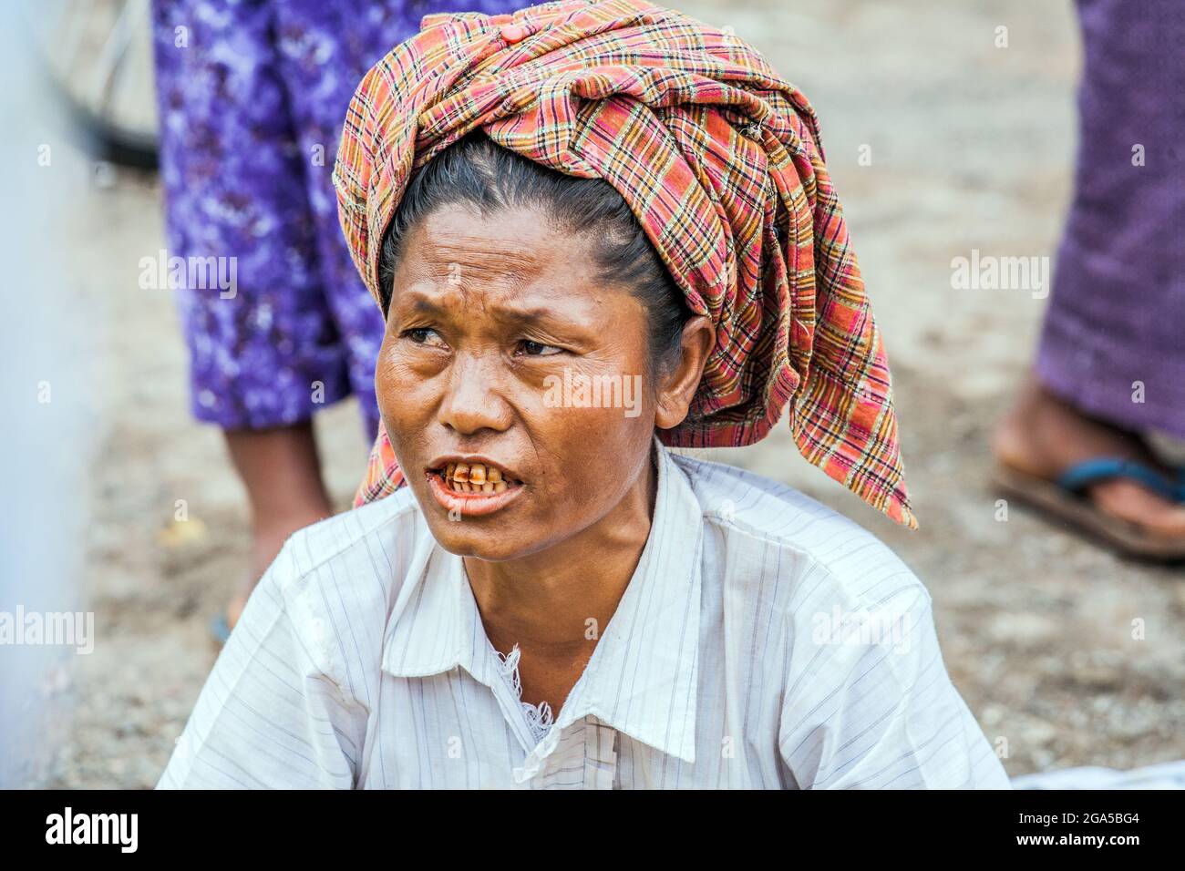Female from Pa'o (Pa-o) ethnic hill tribe wearing tartan turban with ...