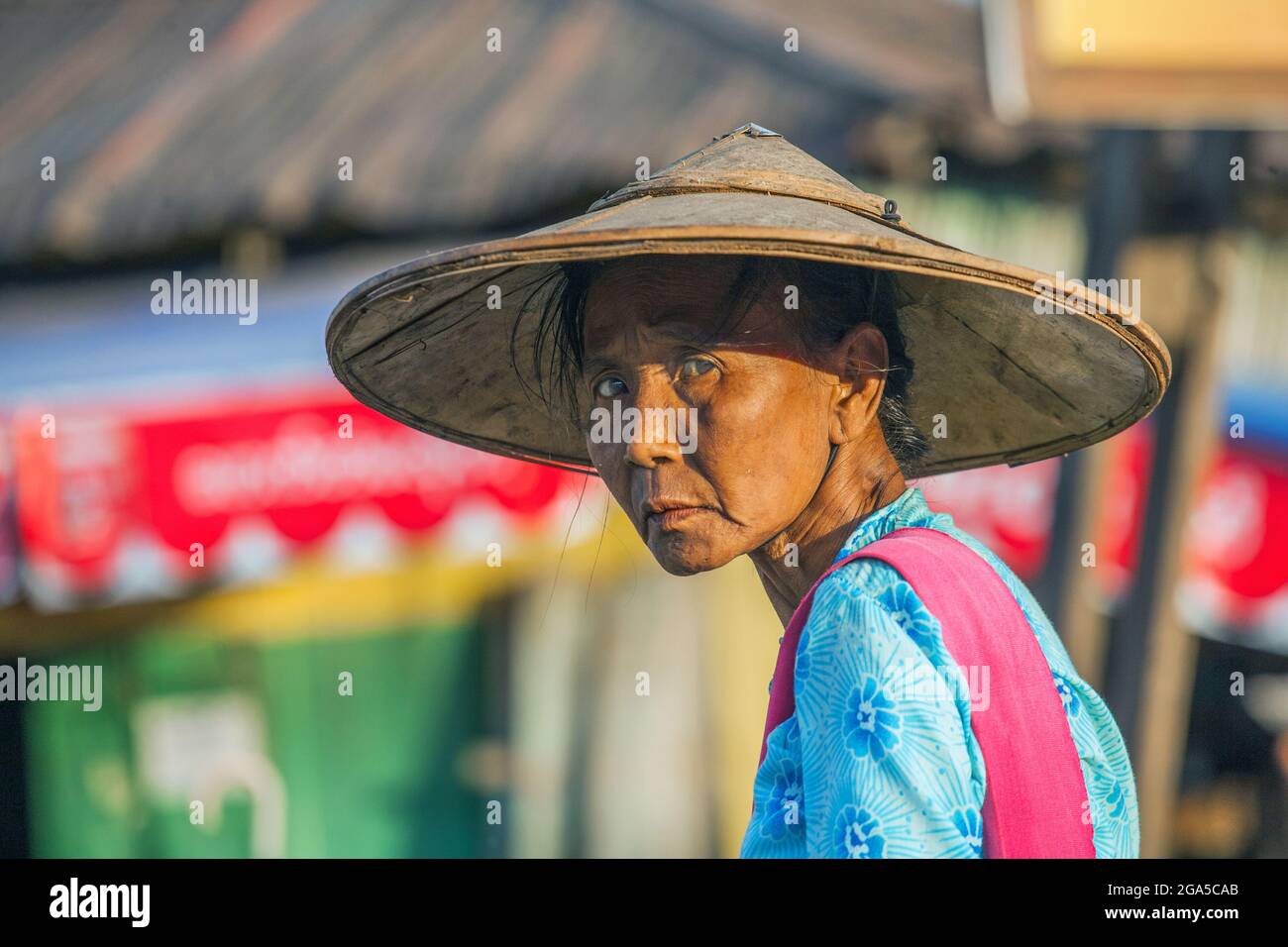 Wearing conical hat hi-res stock photography and images - Alamy