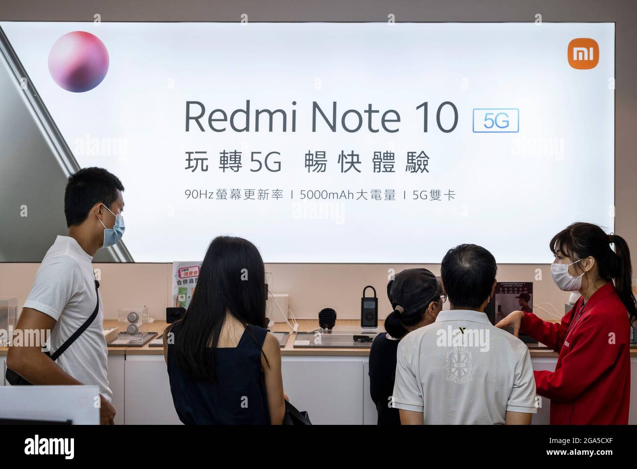 Hong Kong, China. 22nd July, 2021. Shoppers are seen using and testing ...