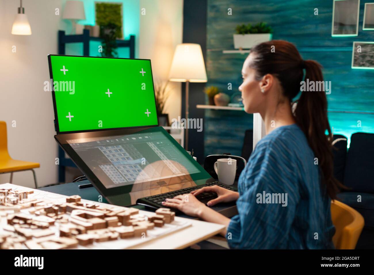 Technician using green screen pc hi-res stock photography and images ...