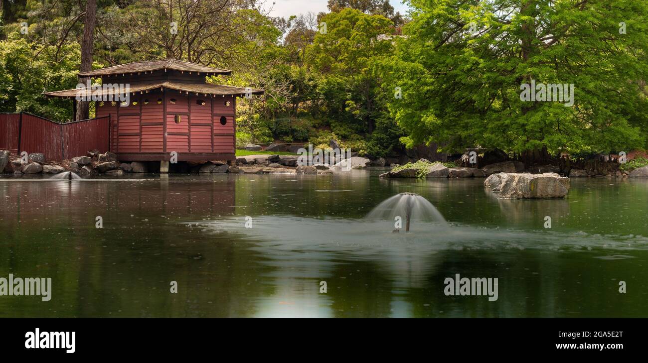 Beautiful Chinese hut near a pond in a forest Stock Photo - Alamy