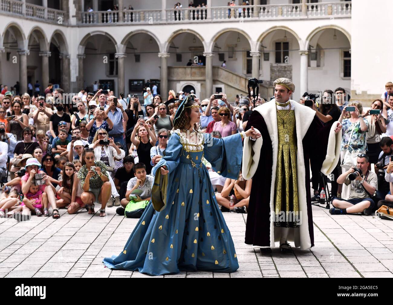 Performers dancing on stage during the fashion show.Dancers from the ...