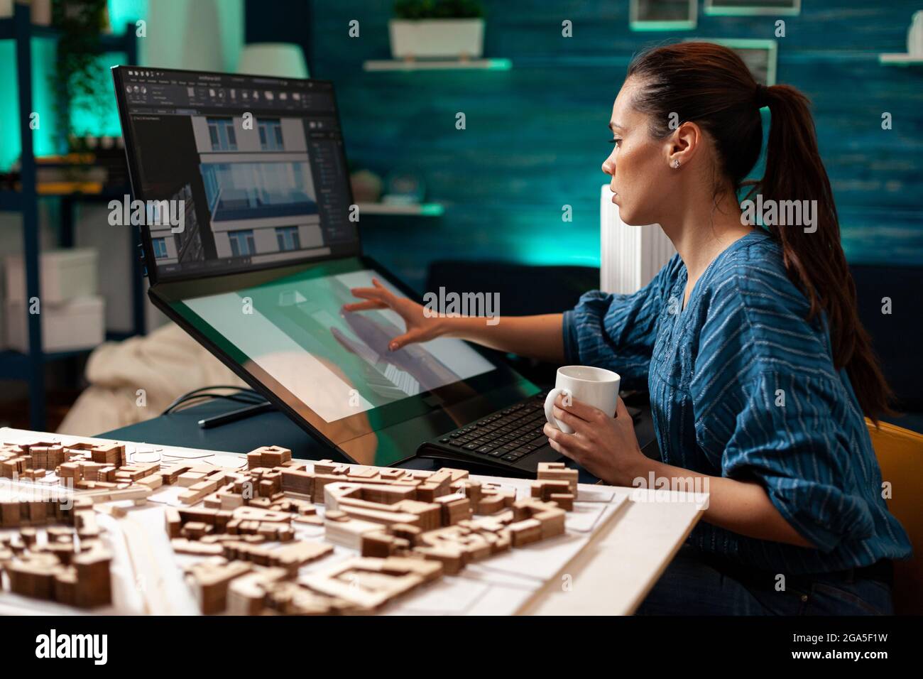 Architectural designer doing engineering sketch using touchpad screen ...