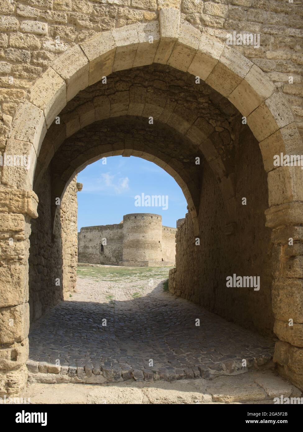 Stone arc with passage in walls of ancient fortress Stock Photo - Alamy