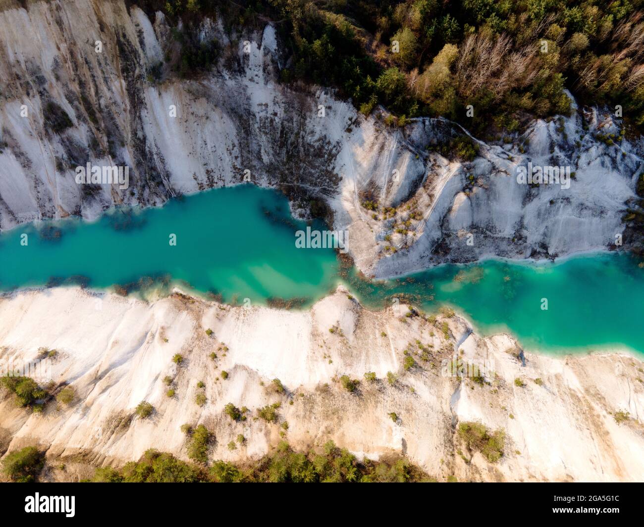 Artificial lake in a chalk quarry in Belarus at Krasnoselsky. Turquoise ...