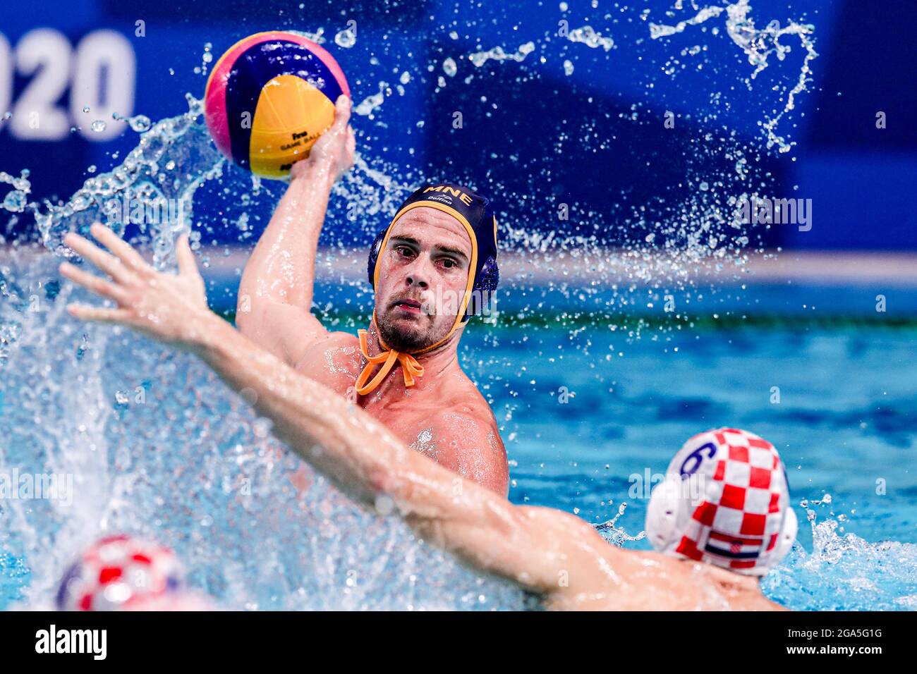 TOKYO, JAPAN - JULY 29: Vlado Popadic of Montenegro, Luka Bukic of ...