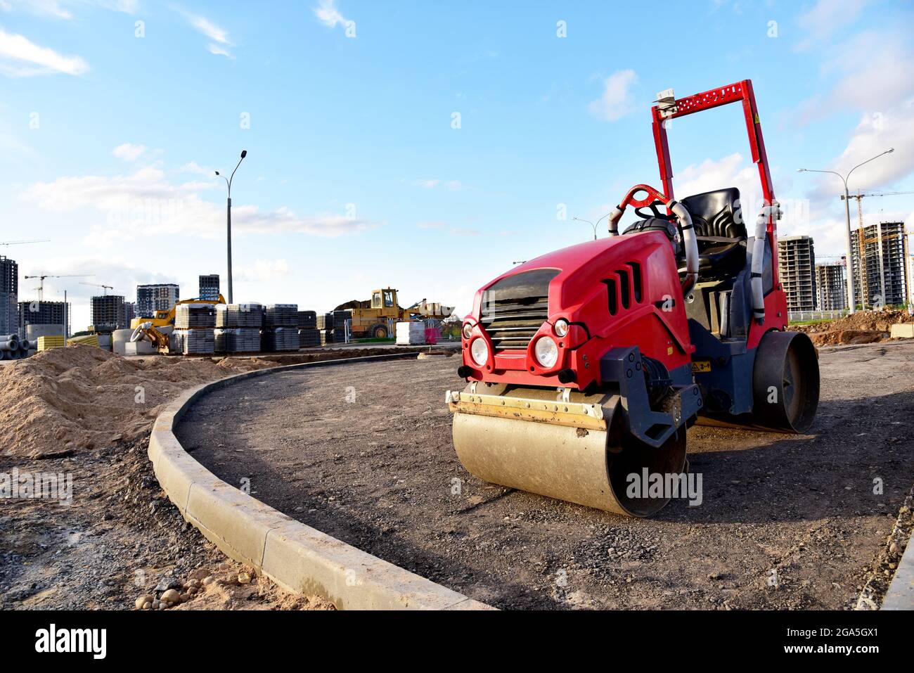 Paving roller machine during road work. Mini road roller at ...