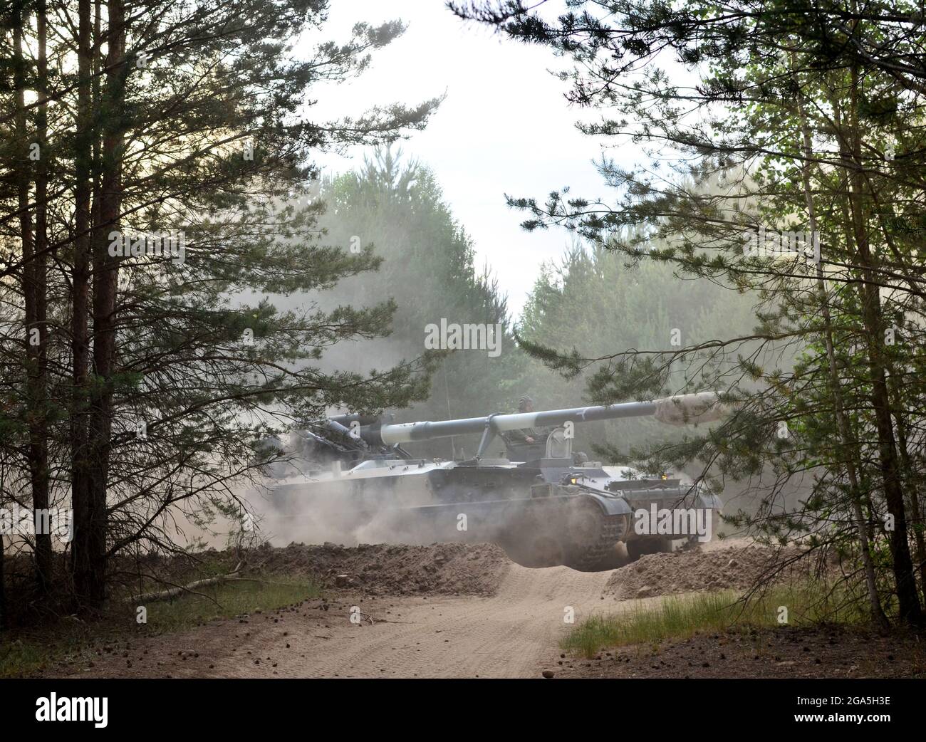 Military tank and military equipment in the forest Stock Photo - Alamy