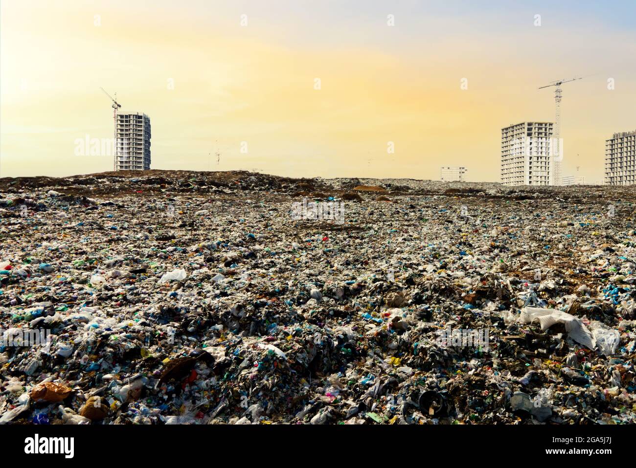 View of the landfill in city against the background of construction ...