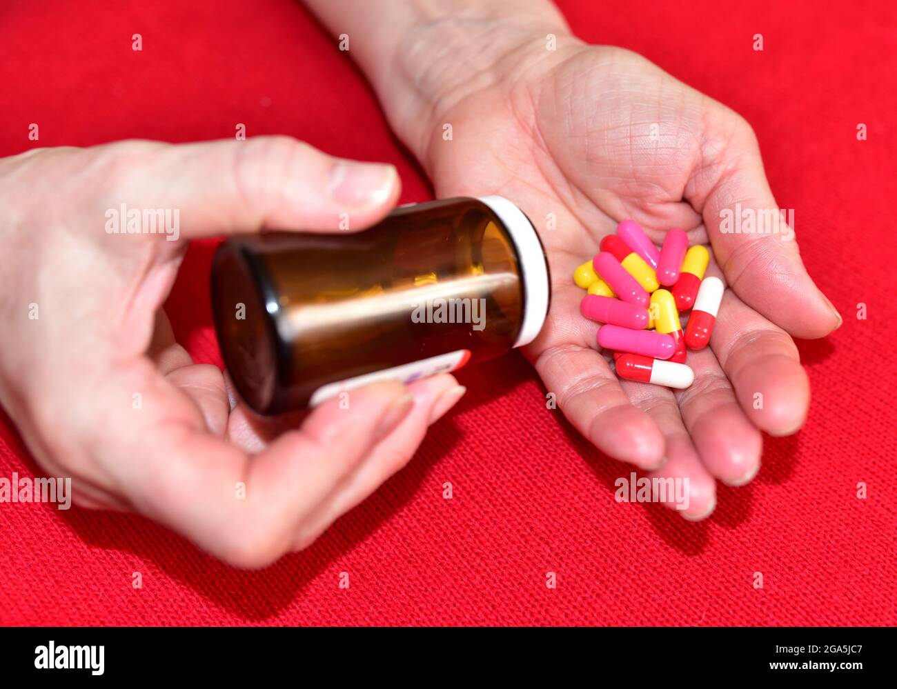 Pills in capsules in woomen hand. Medicine grade pharmaceutical tablets ...