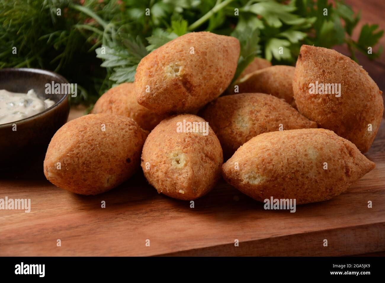 Deep fried kibbeh of ground beef meat mixed with bulgur, stuffed with ...