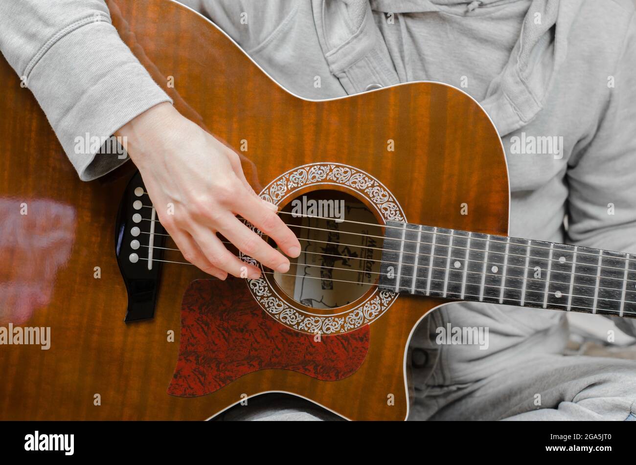 Rock musician plays guitar close hi-res stock photography and images ...