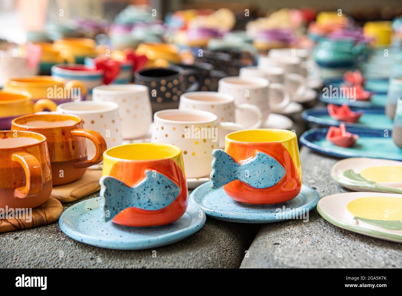 handmade ceramic coffee cups with fish figure Stock Photo - Alamy