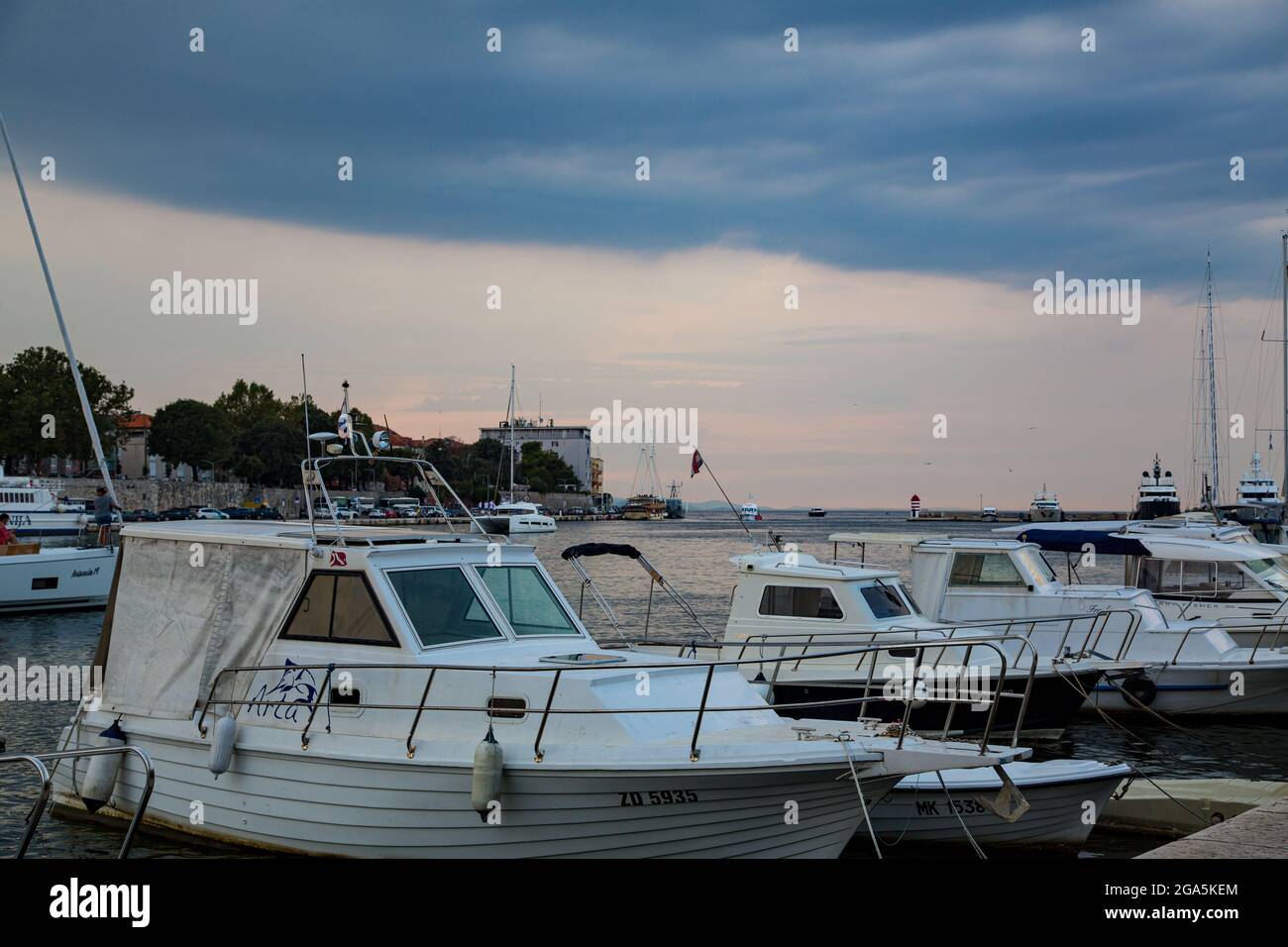 Small picturesque ports with boats Stock Photo - Alamy