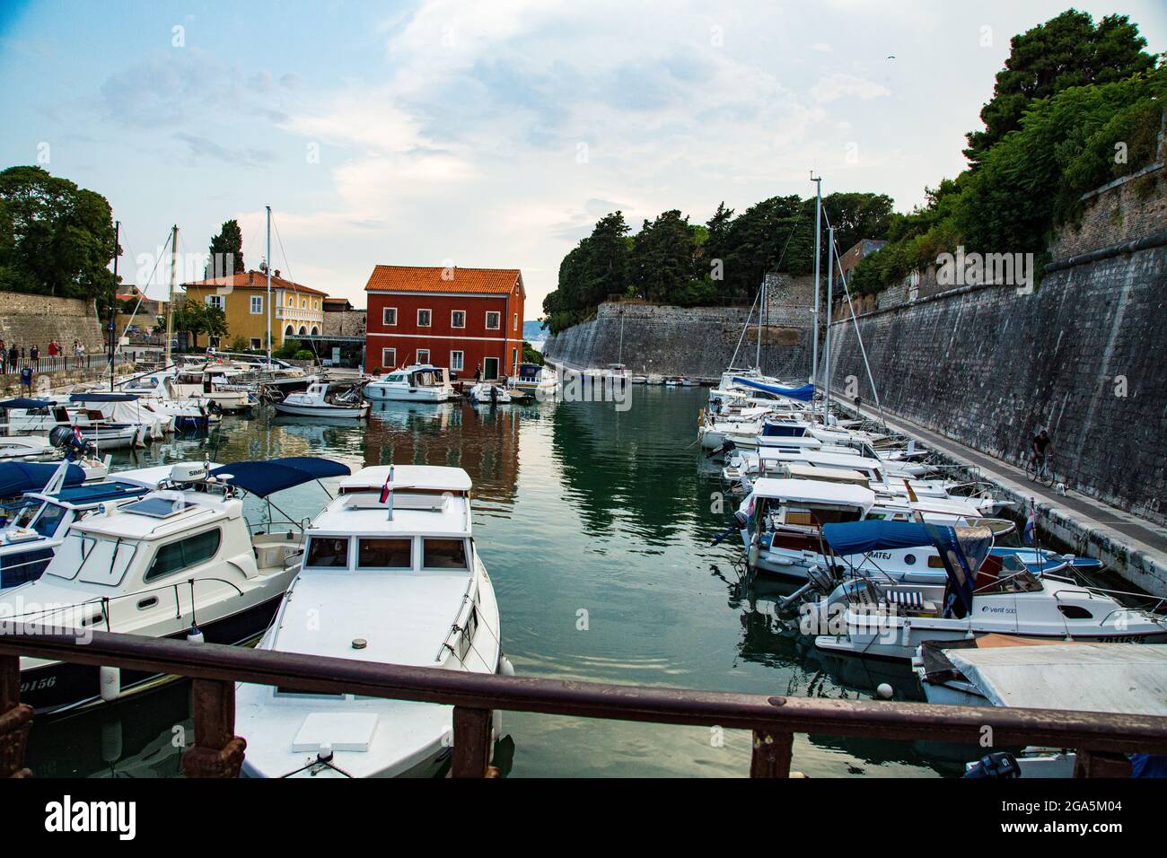 Small picturesque ports with boats Stock Photo - Alamy