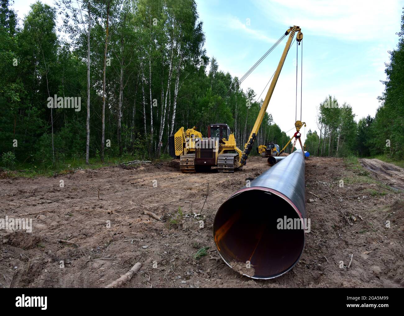 Pipelayer with side boom Installation of gas and crude oil pipes in ...