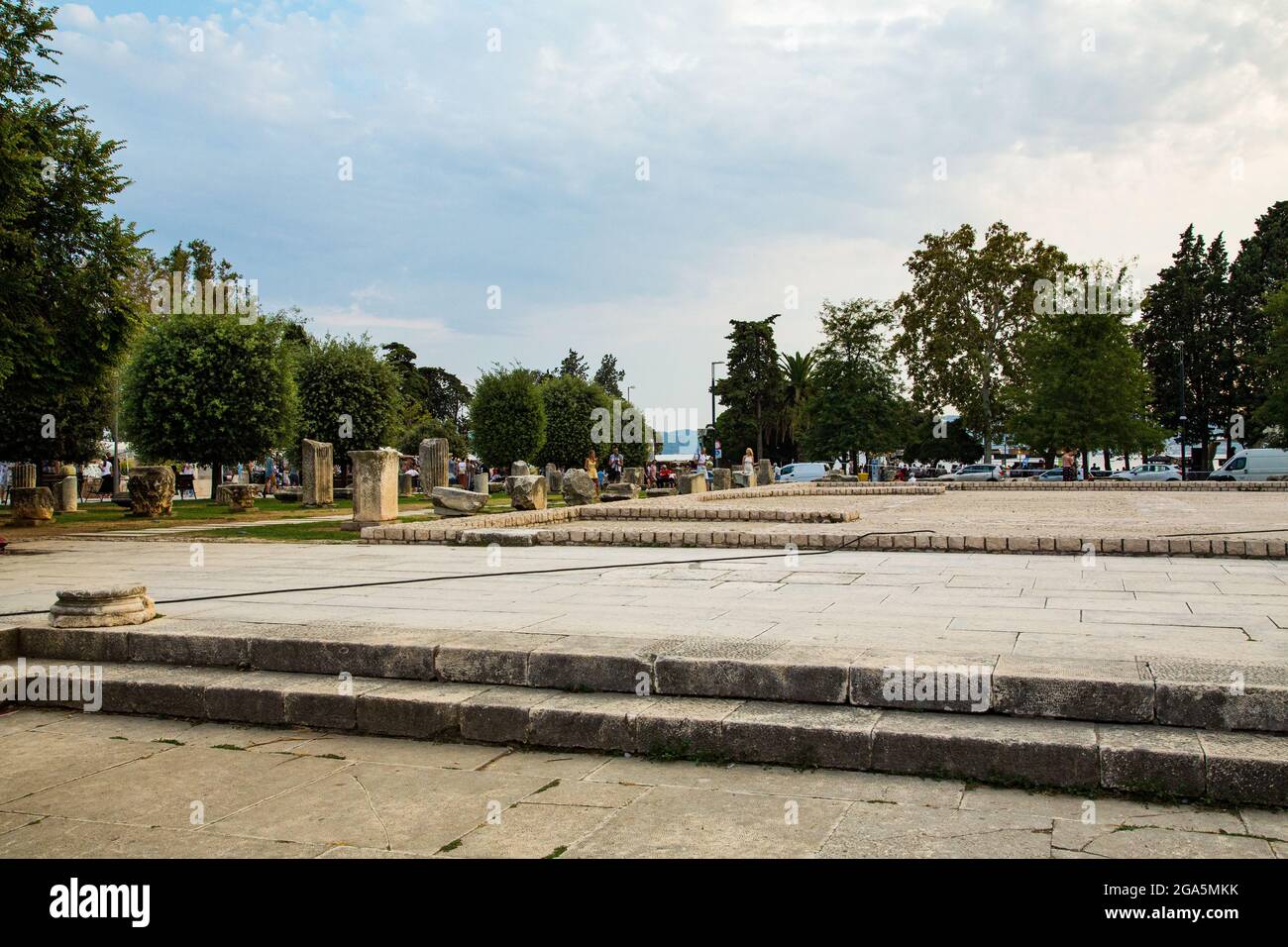 Roman ruined foundations with trees around Stock Photo - Alamy
