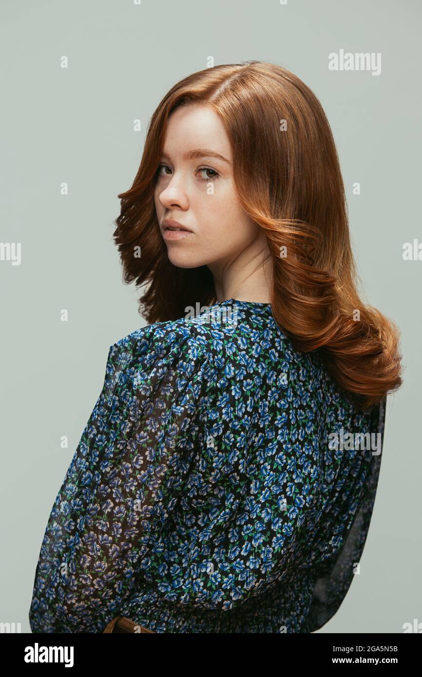 Portrait of young redheaded girl in retro style, fashion of 70s, 80s ...