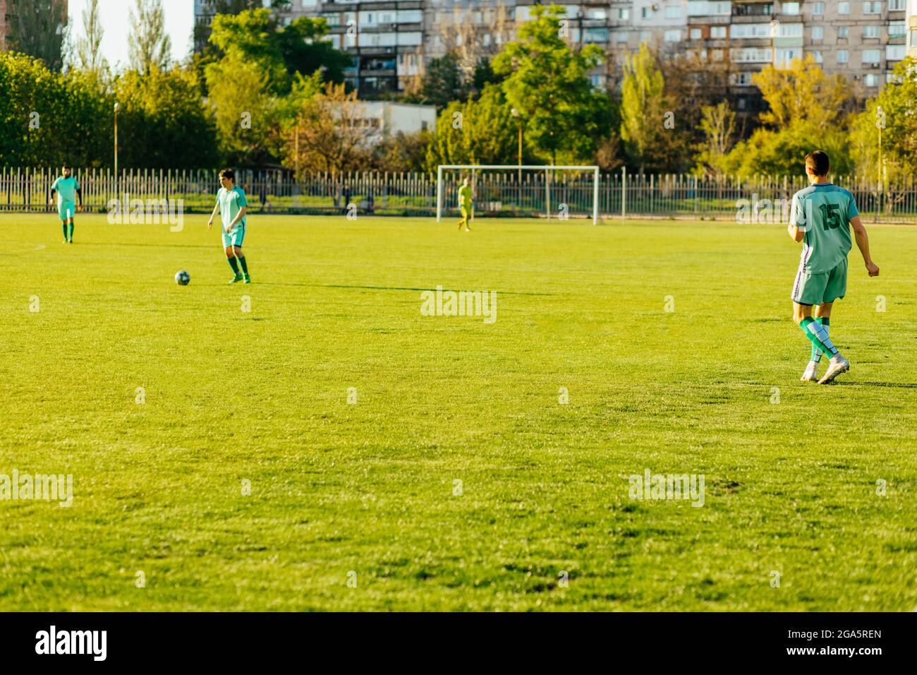 Action competitive field player sport sports stadium team uniform hi ...