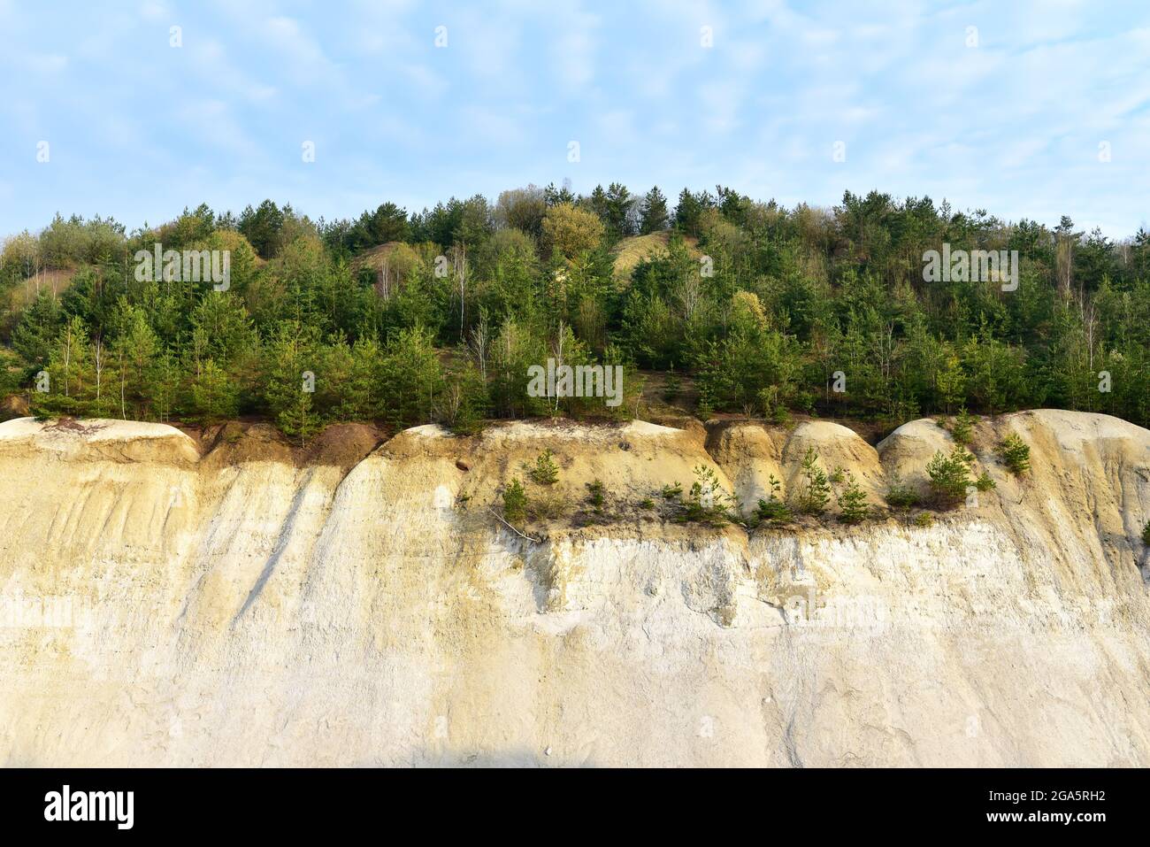 Chalk structure on artificial mountain after quarry mining. Technogenic ...