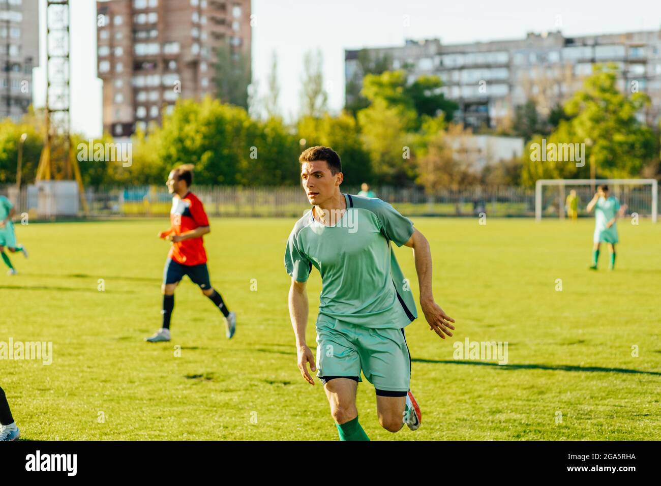 Sports soccer players in training, soccer players kick soccer balls in ...