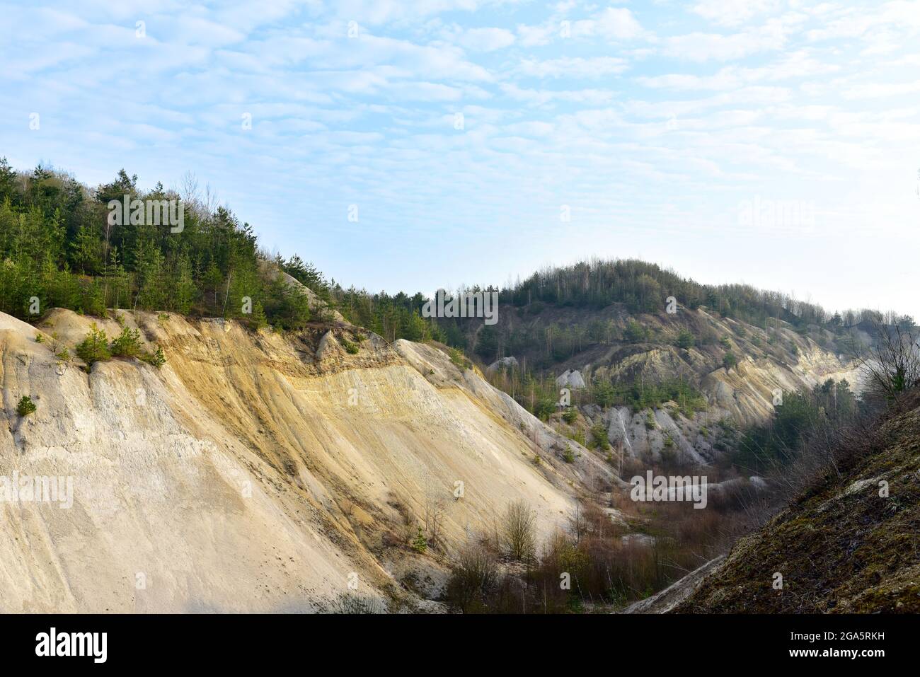 Chalk structure on artificial mountain after quarry mining. Technogenic ...