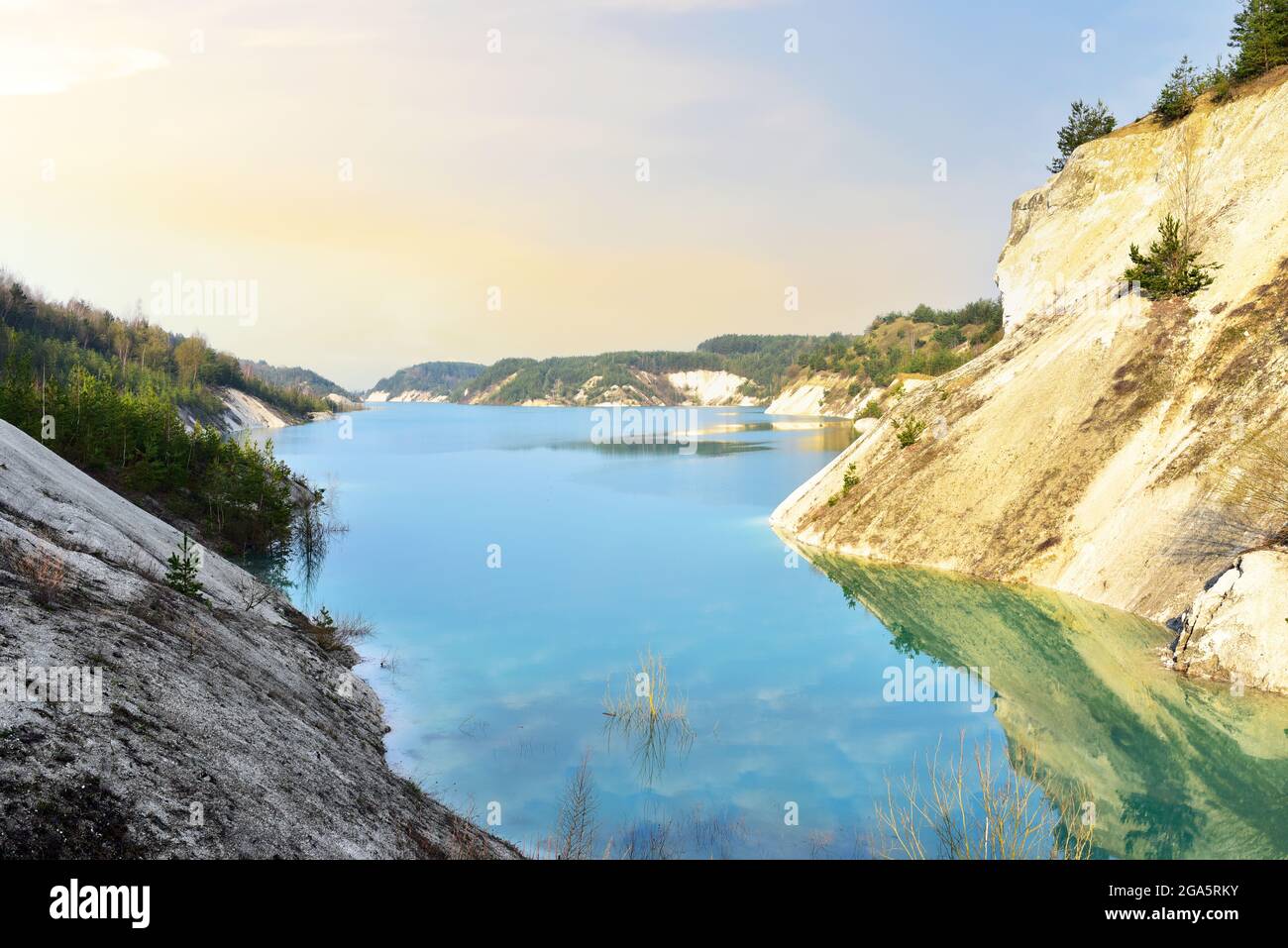 Artificial lake in a chalk quarry in Belarus at Krasnoselsky. Turquoise ...