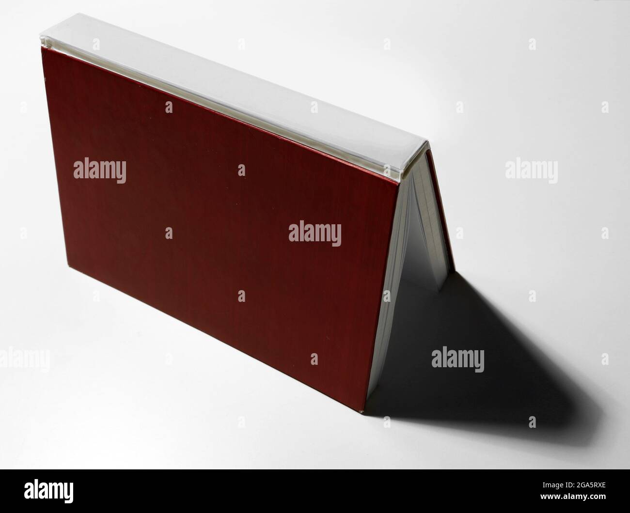 Textbook on white background Stock Photo - Alamy