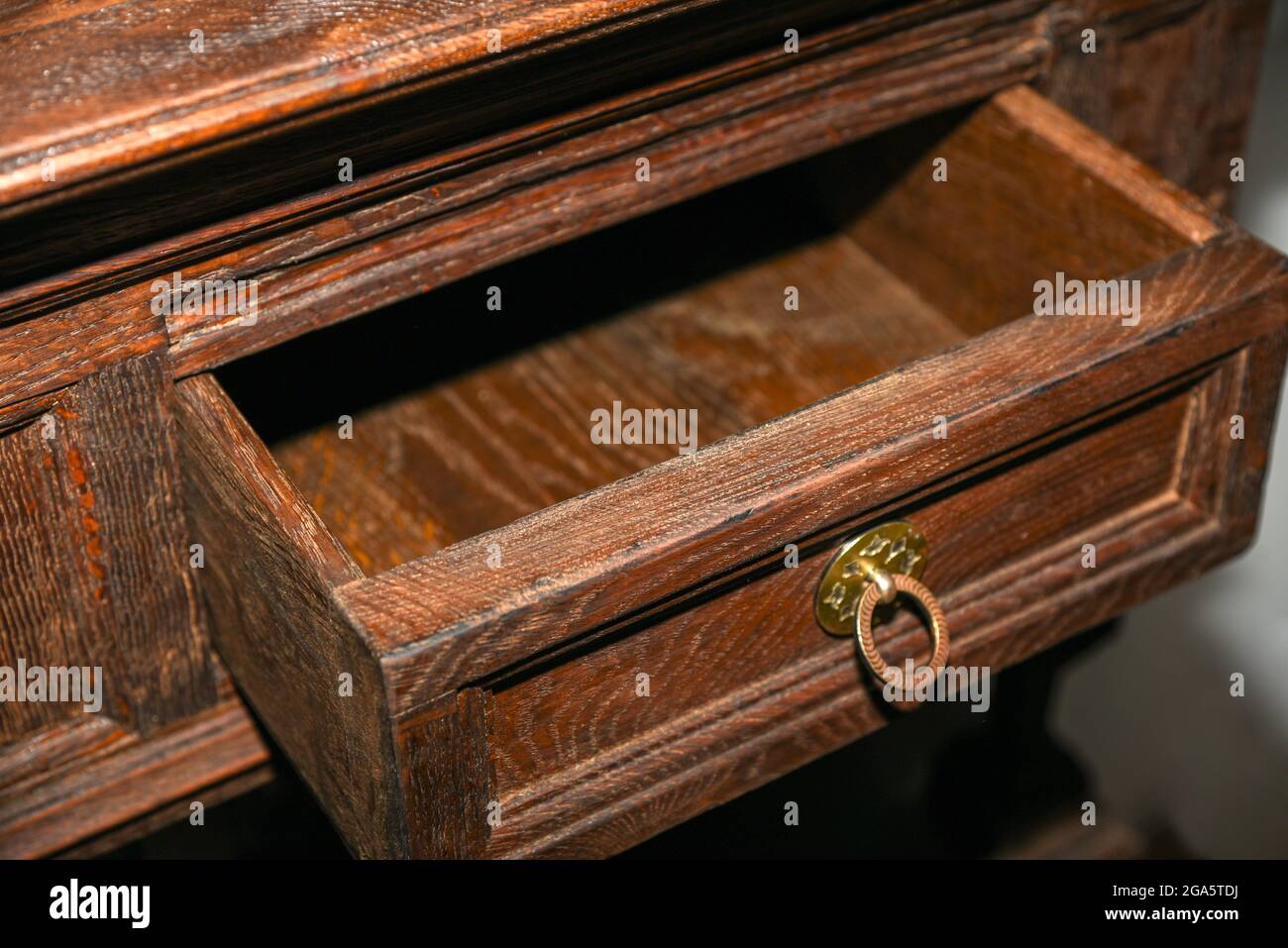 Extended shelf with wooden retro chest of drawers Stock Photo - Alamy