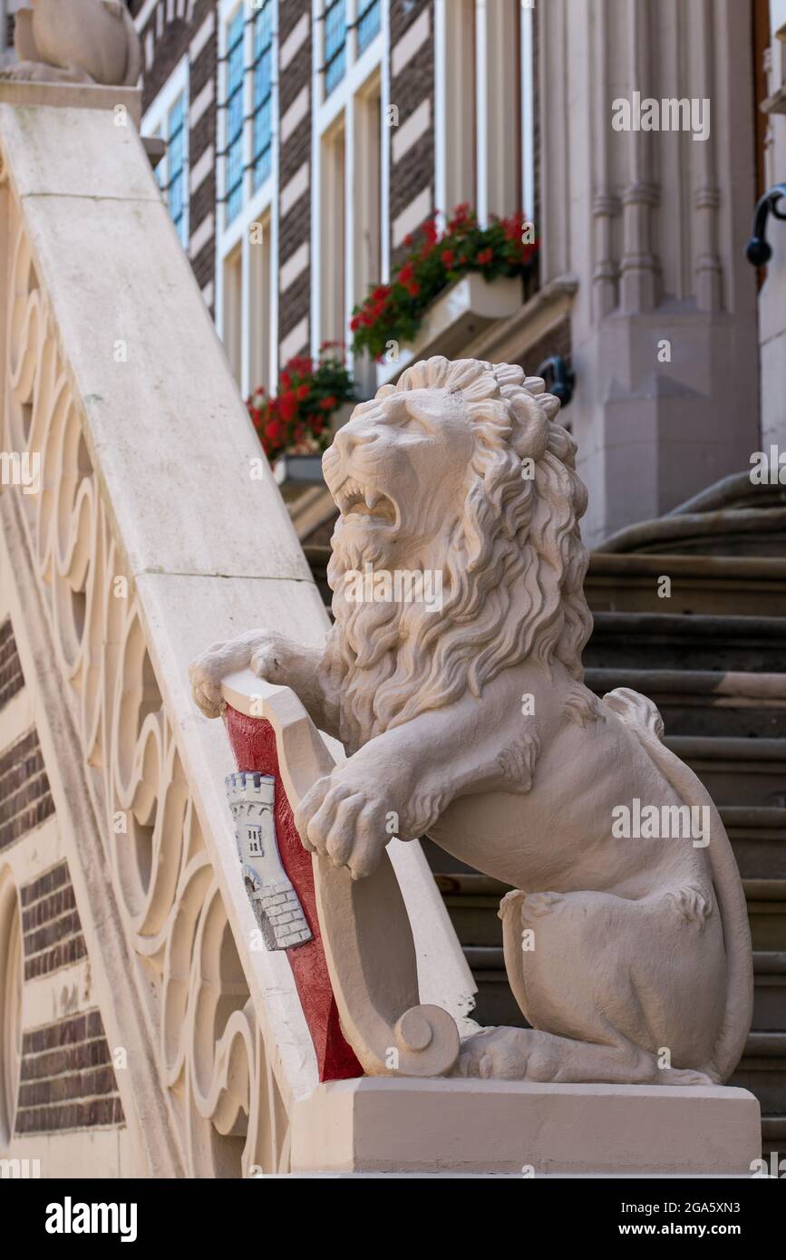 Alkmaar, the netherlands. June 2021. Sculpture of a lion at the stairs ...