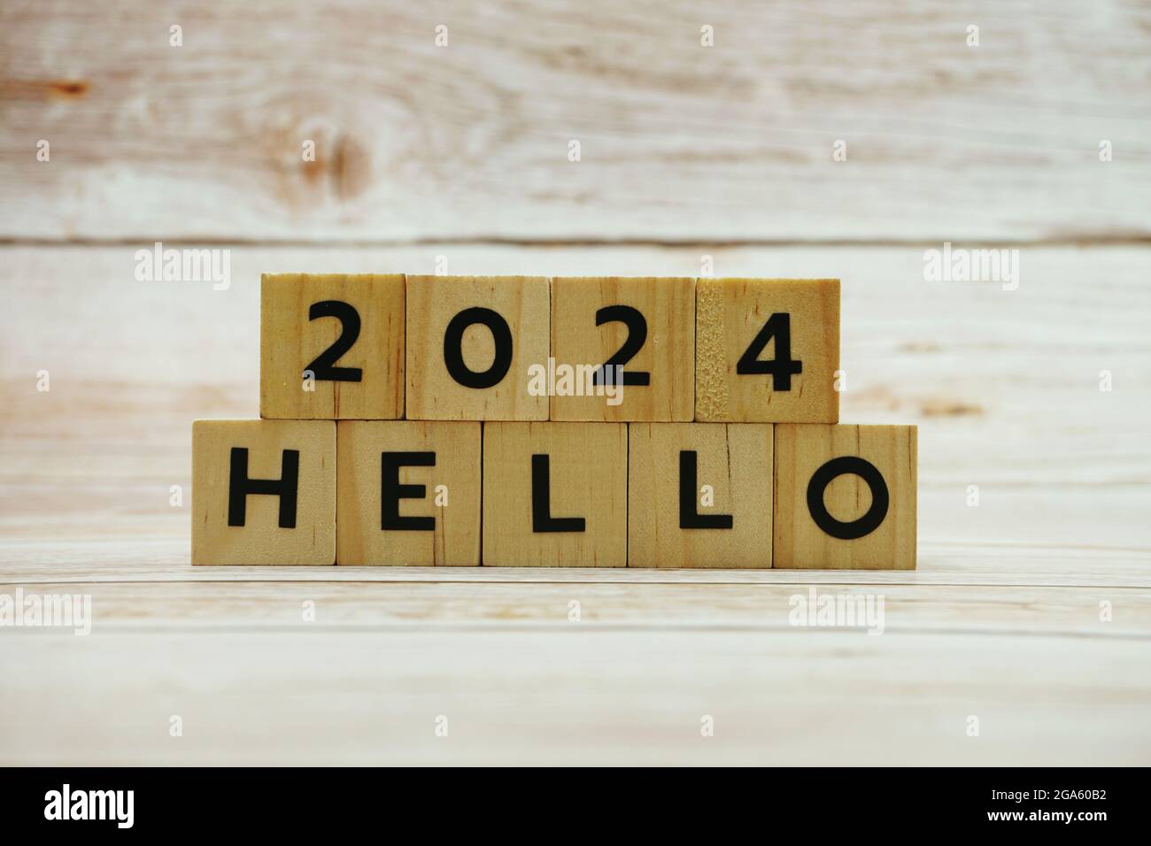 Happy New Year concept Hello 2024 alphabet letters on wooden background ...